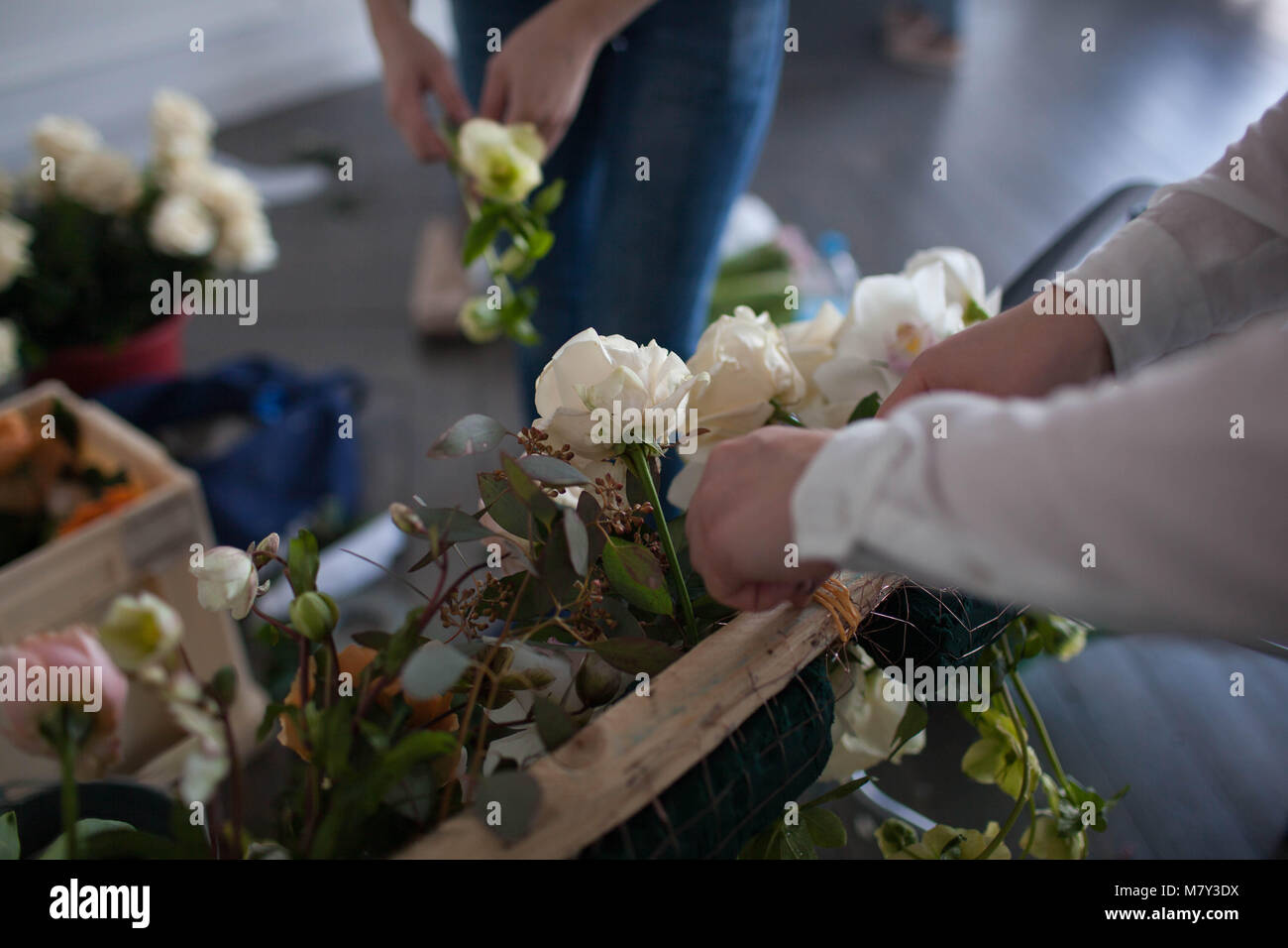 Florists make a floral arrangement. Process of work Stock Photo - Alamy