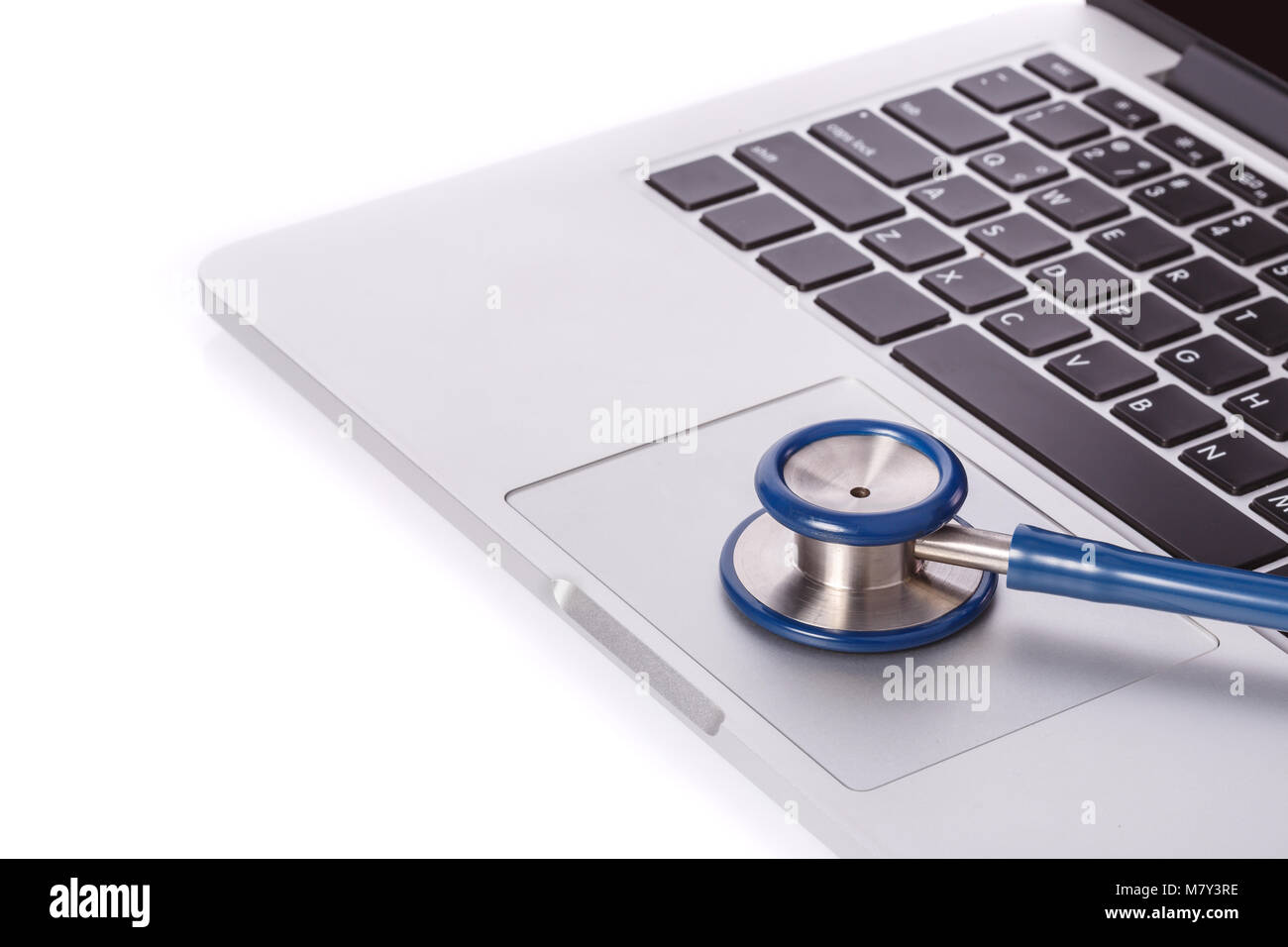 Close up computer notebook or laptop and stethoscope. Checking virus or ...