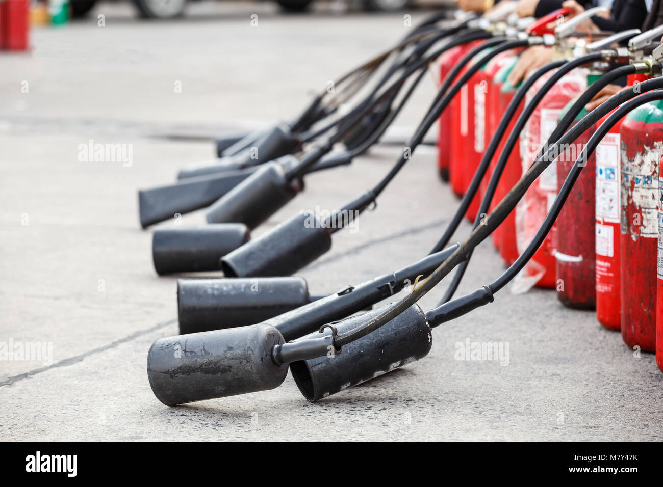 Firefighter using extinguisher water hi-res stock photography and ...