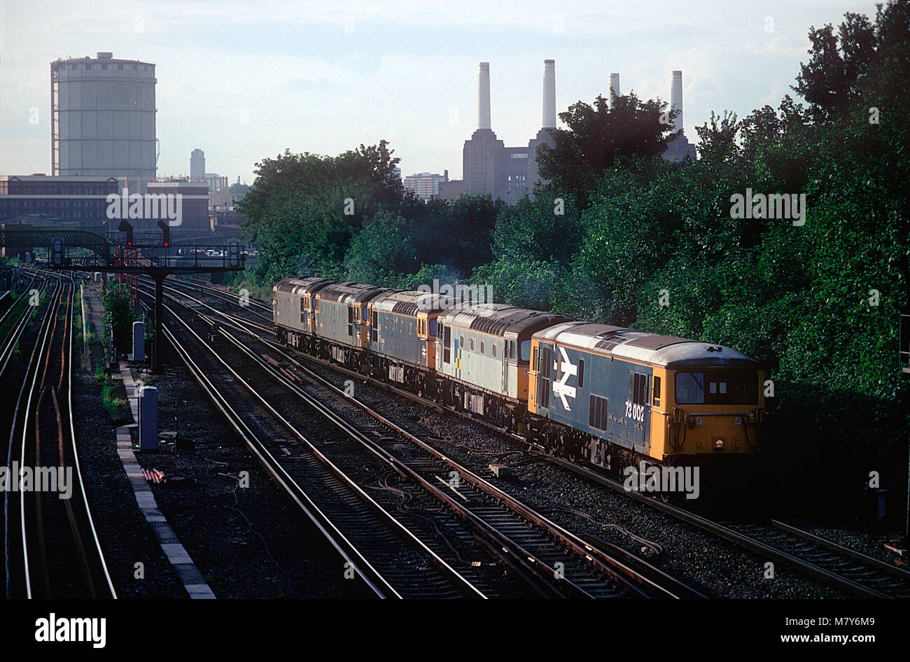 Class 73 JA electro diesel locomotive number 73002 leading a convoy of ...