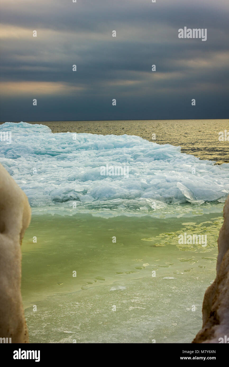 Baltic Sea Beach with Ice Floating in a Water on a Sunny Winter Day ...