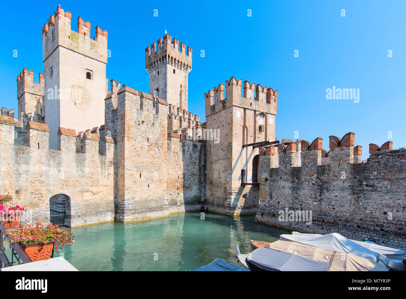 Italy September 2017. Sirmione. medieval castle Scaliger on lake Garda ...
