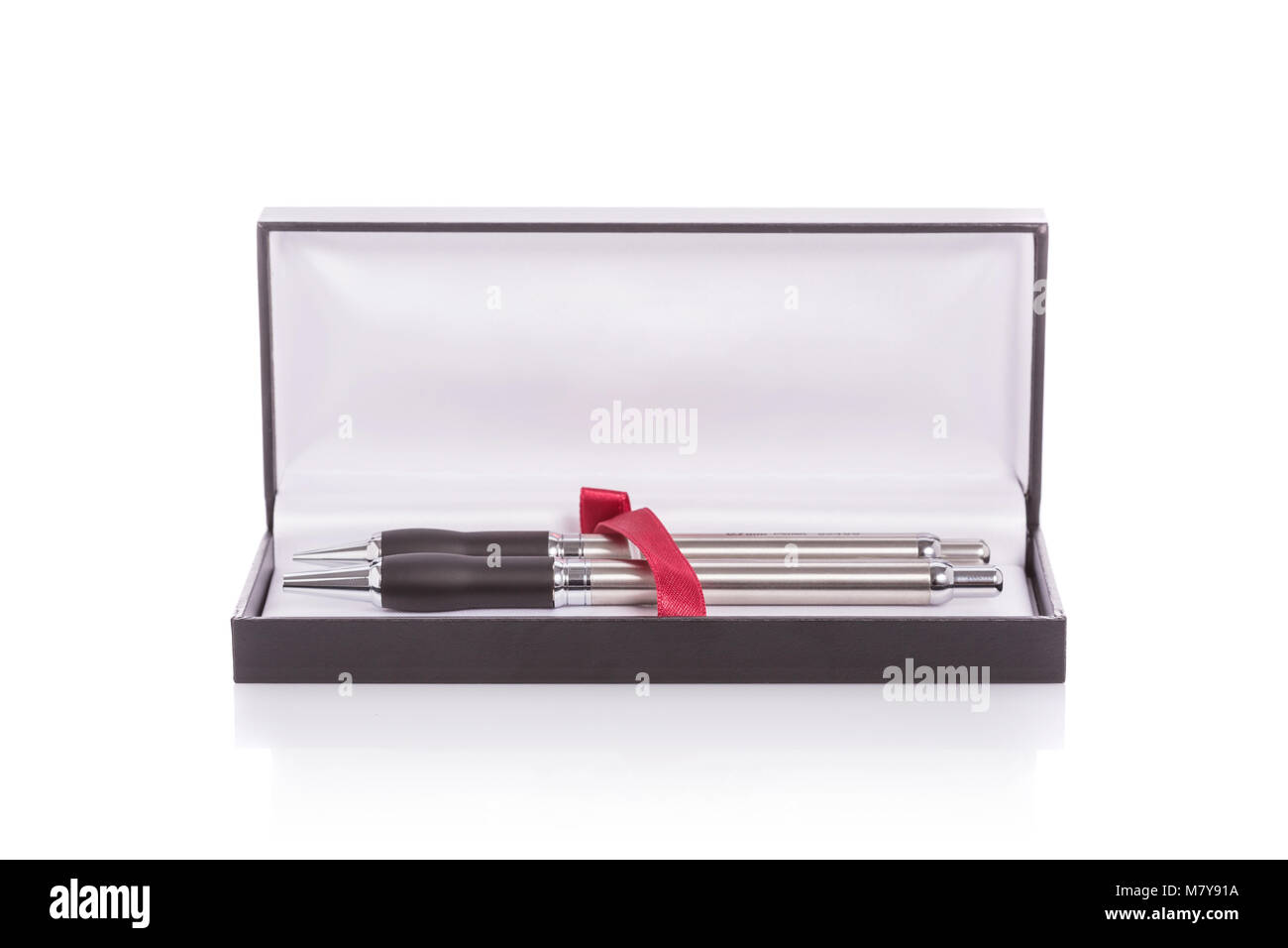 New silver ballpoint pen. Studio shot isolated on white background ...