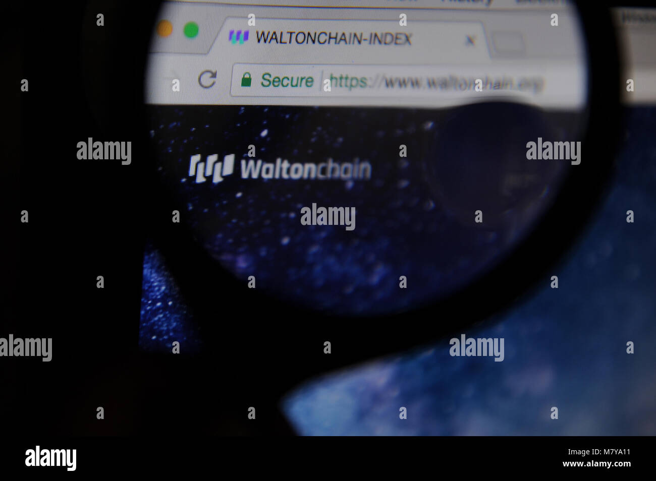 The Walton Chain website seen through a magnifying glass Stock Photo - Alamy