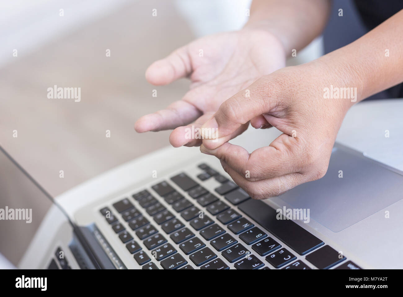 Close up woman holding and pressing or touching her finger while ...