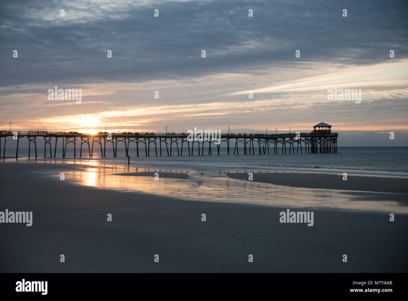 sunset at the north carolina beach with atlantic beach pier and sunrise ...