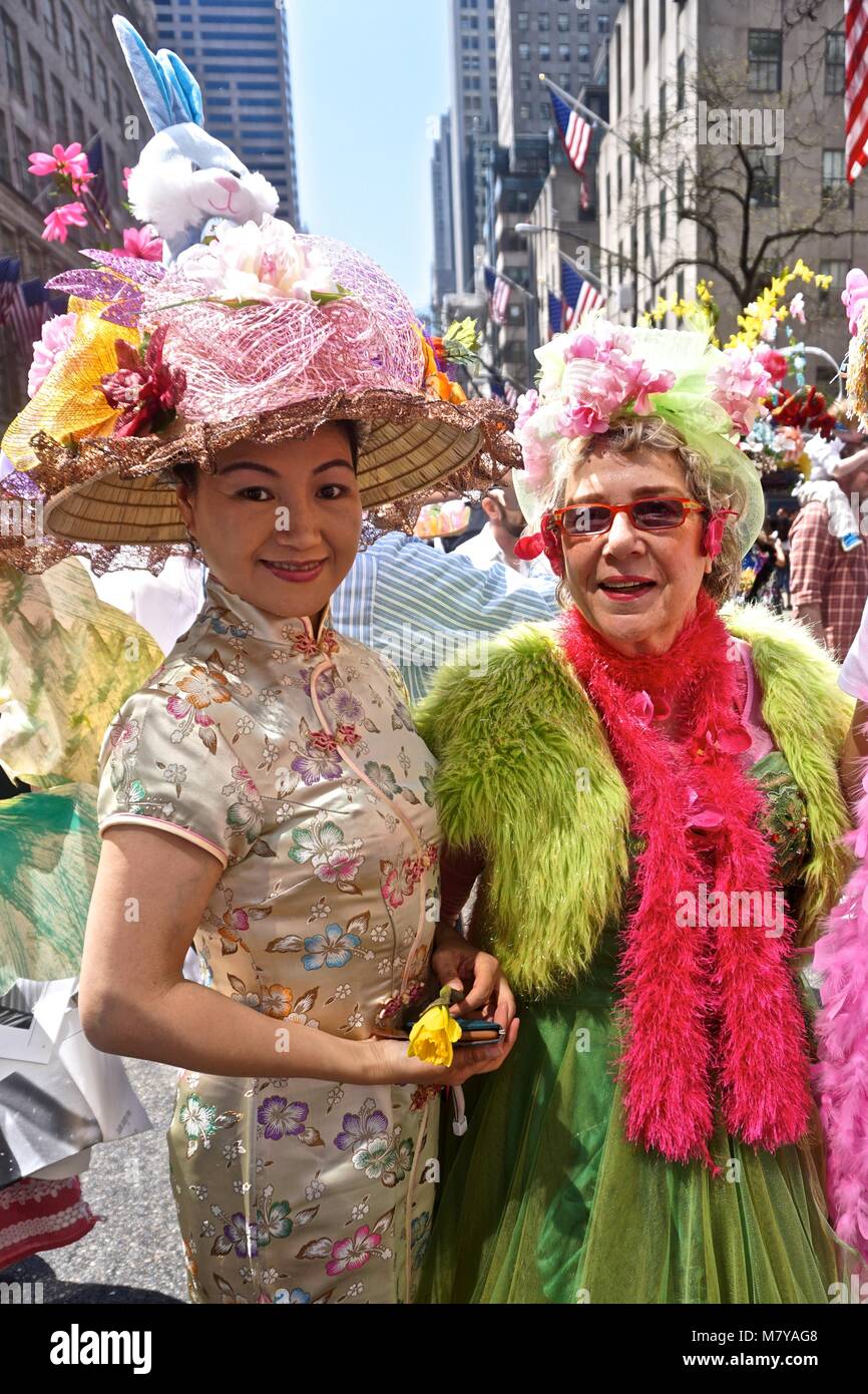 Two women wearing colorful Easter outfits at the Fifth Avenue Easter ...