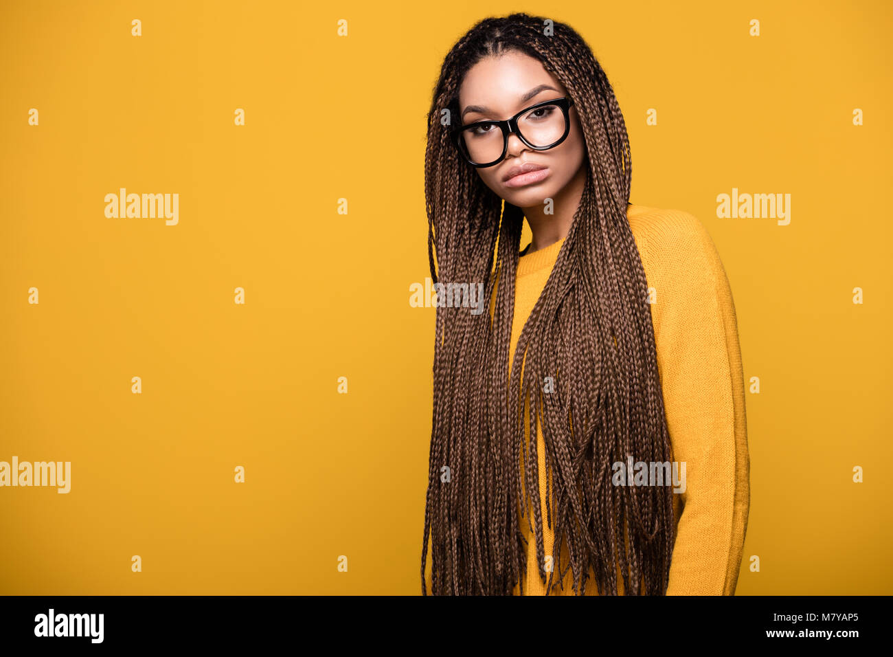Yellow braids female hi-res stock photography and images - Alamy