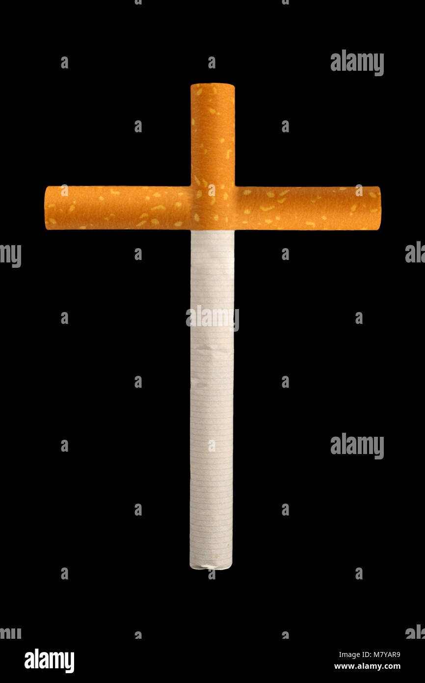 A Isolated Cigarette cross on a black background Stock Photo - Alamy