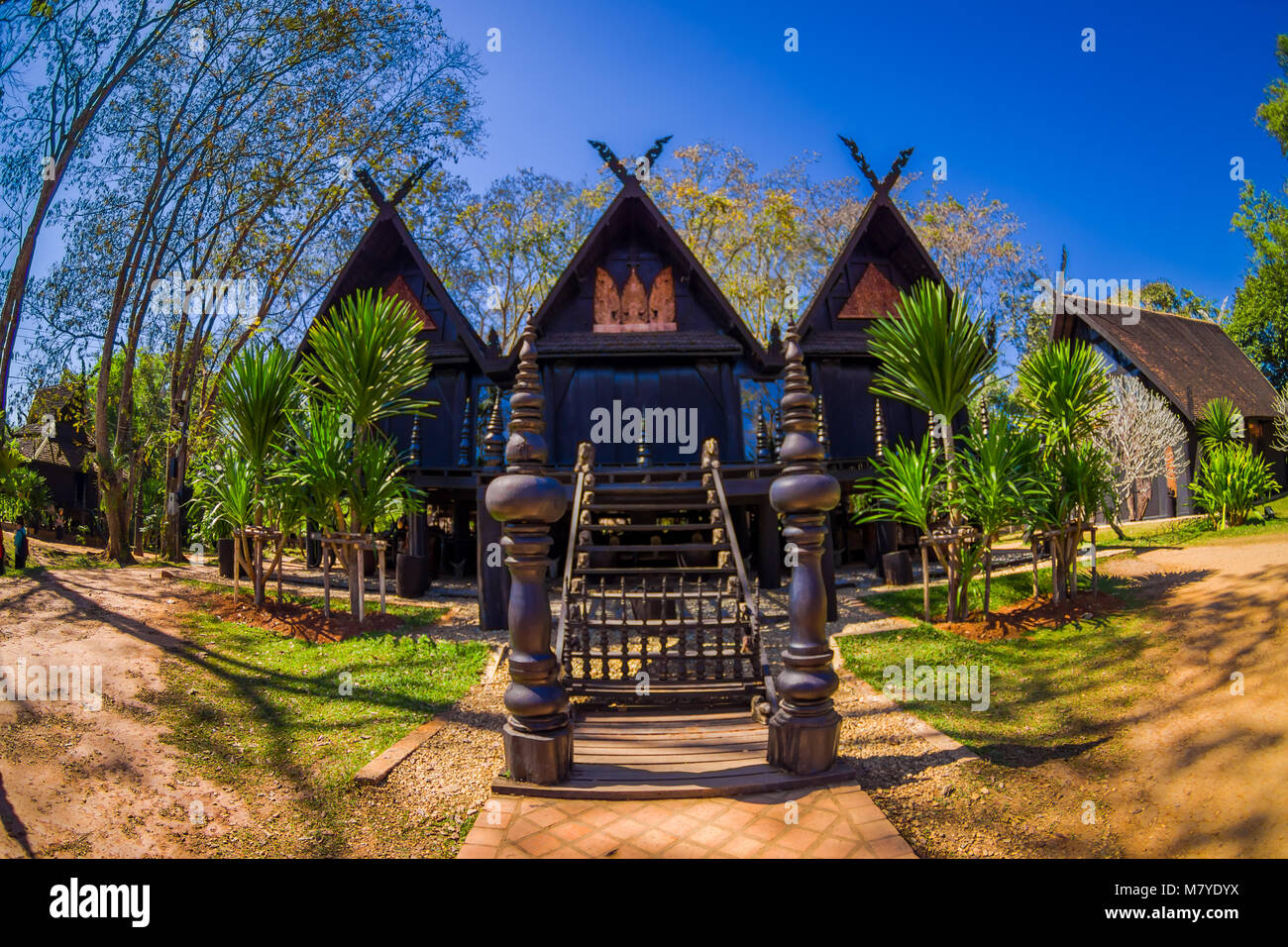 Ban Dam Kalae Kieo Fa is a vintage triplets house architecture. The ...