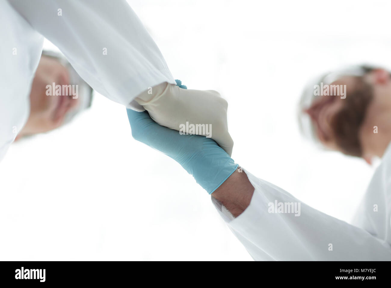 two scientist Shake hands after test completed Stock Photo - Alamy