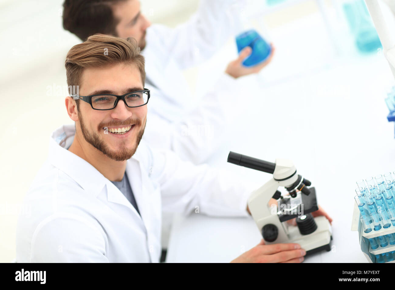closeup. a biologist working in the laboratory Stock Photo - Alamy