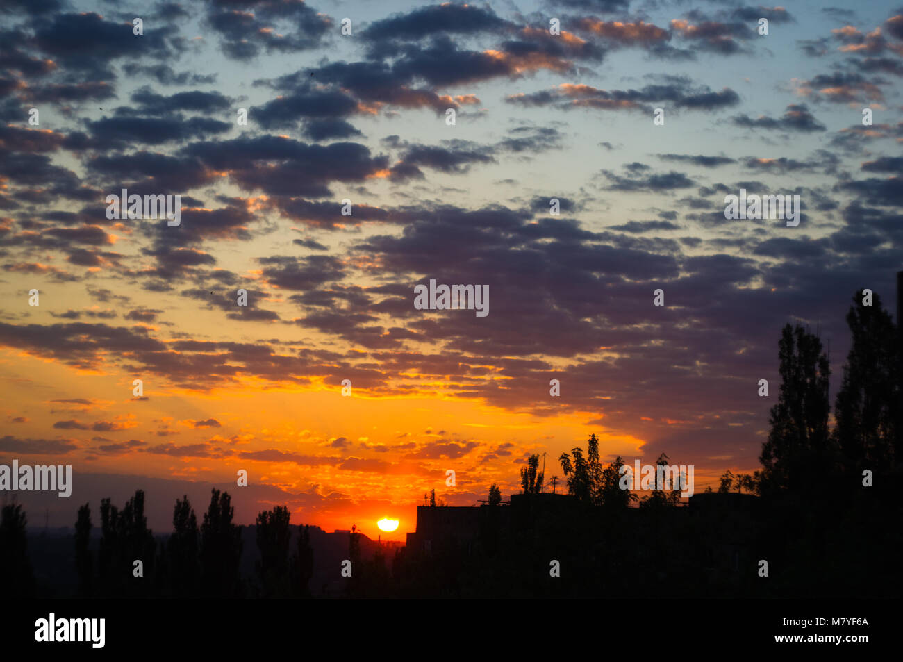Landscape with dramatic light - beautiful golden sunset with saturated ...