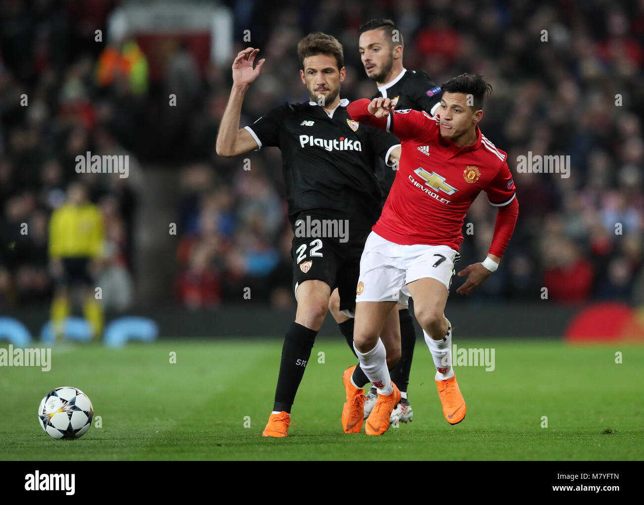 Manchester United's Alexis Sanchez is challenged by Sevilla's Franco ...
