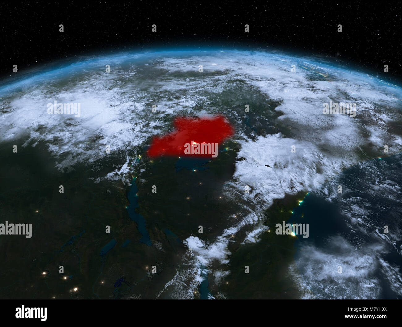 Satellite night view of Uganda highlighted in red on planet Earth with clouds. 3D illustration ...
