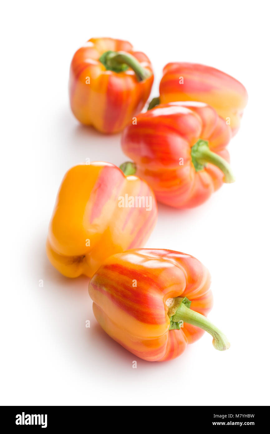 Double color bell peppers isolated on white background Stock Photo - Alamy