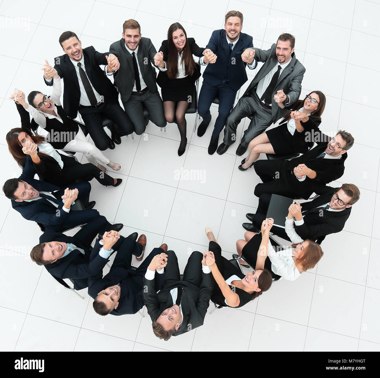 concept of team building .large successful business team sitting in a ...