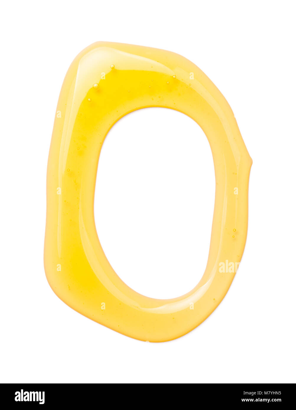 Honey isolated on white background. Letter O shape. Top view Stock ...