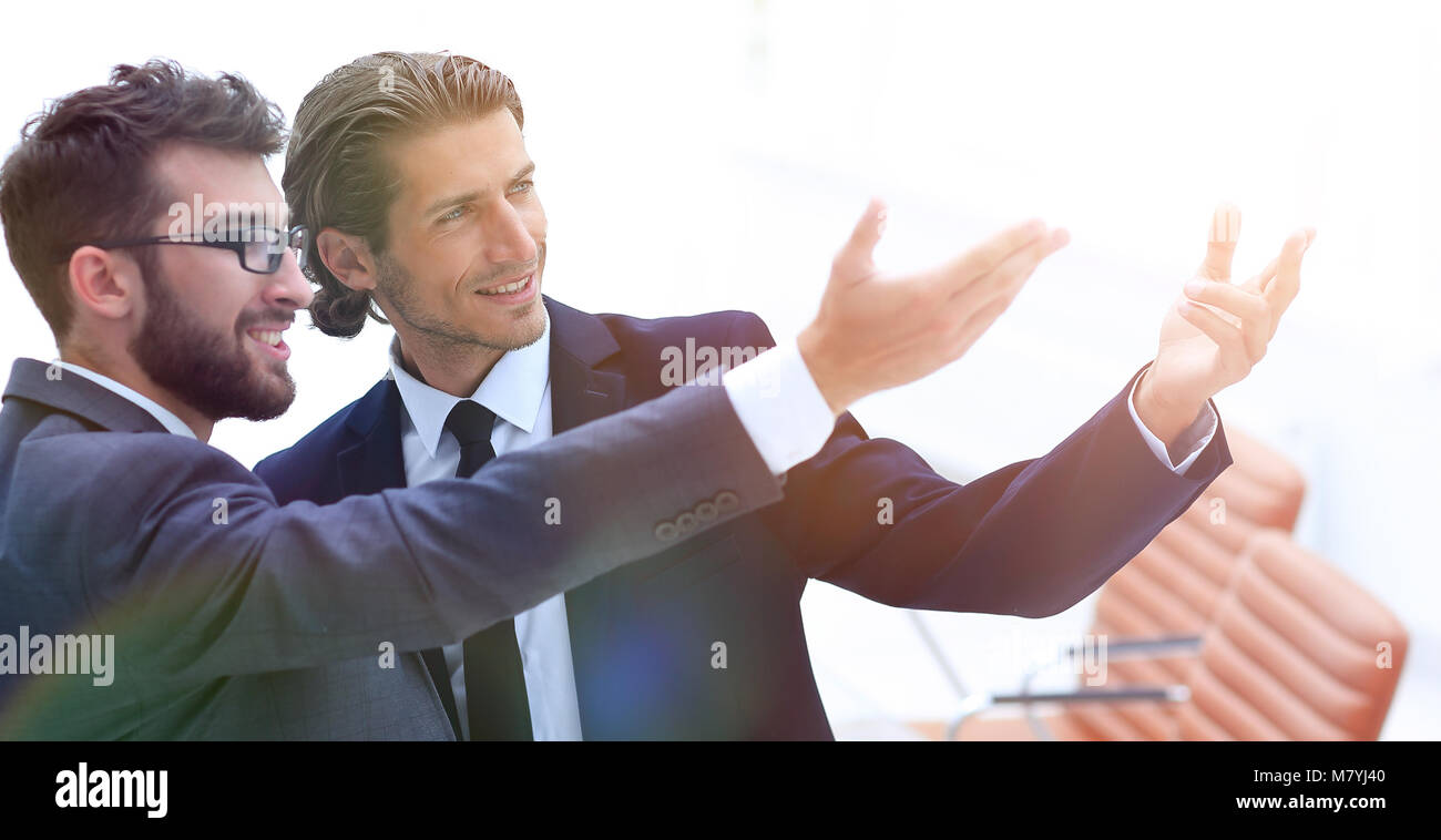 Business partners pointing blank hi-res stock photography and images ...