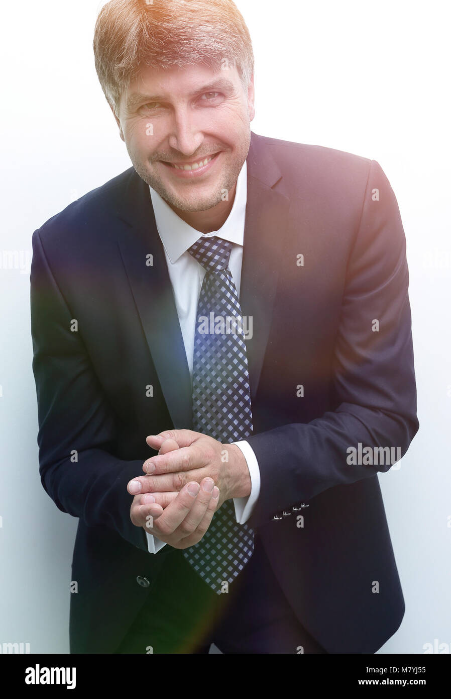 Portrait of a friendly businessman Stock Photo - Alamy