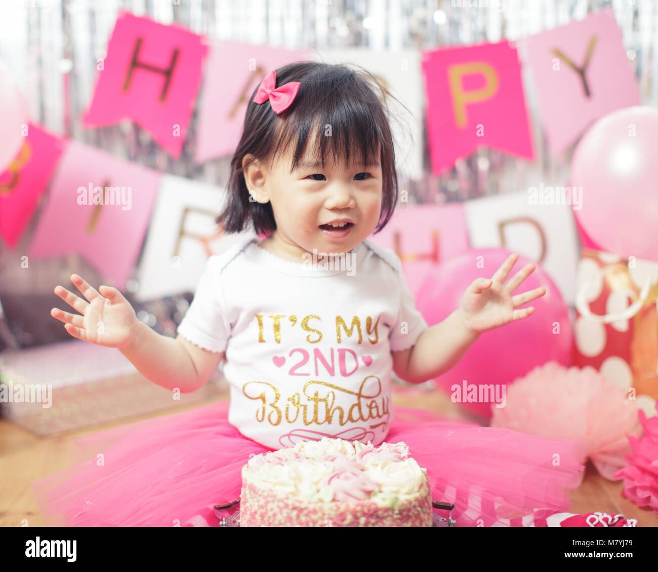 Baby girl celebrate her second birthday Stock Photo - Alamy