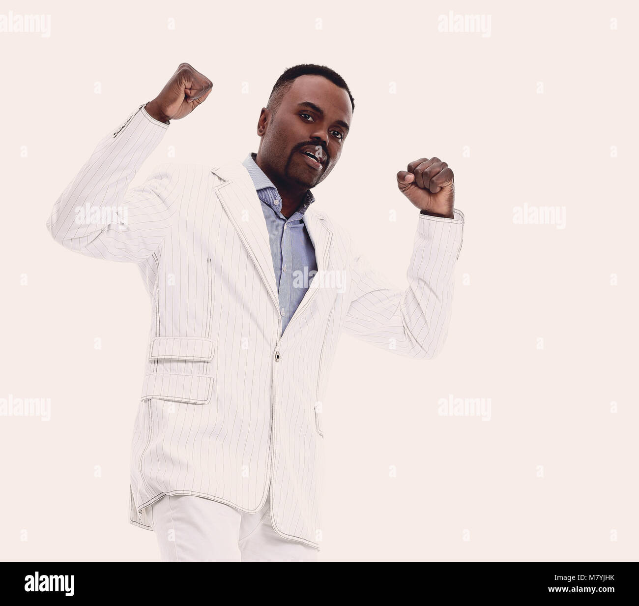 cheerful black african man celebration cheer in studio Stock Photo - Alamy