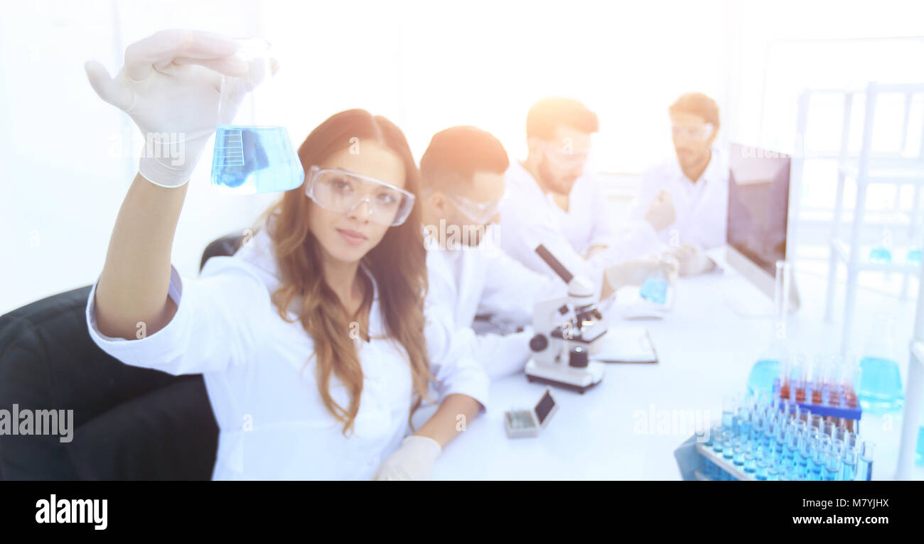 group of young scientists working in the laboratory Stock Photo - Alamy