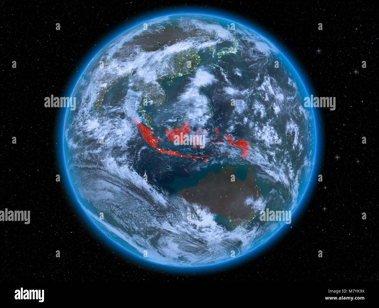 Night view of Indonesia highlighted in red on planet Earth with ...