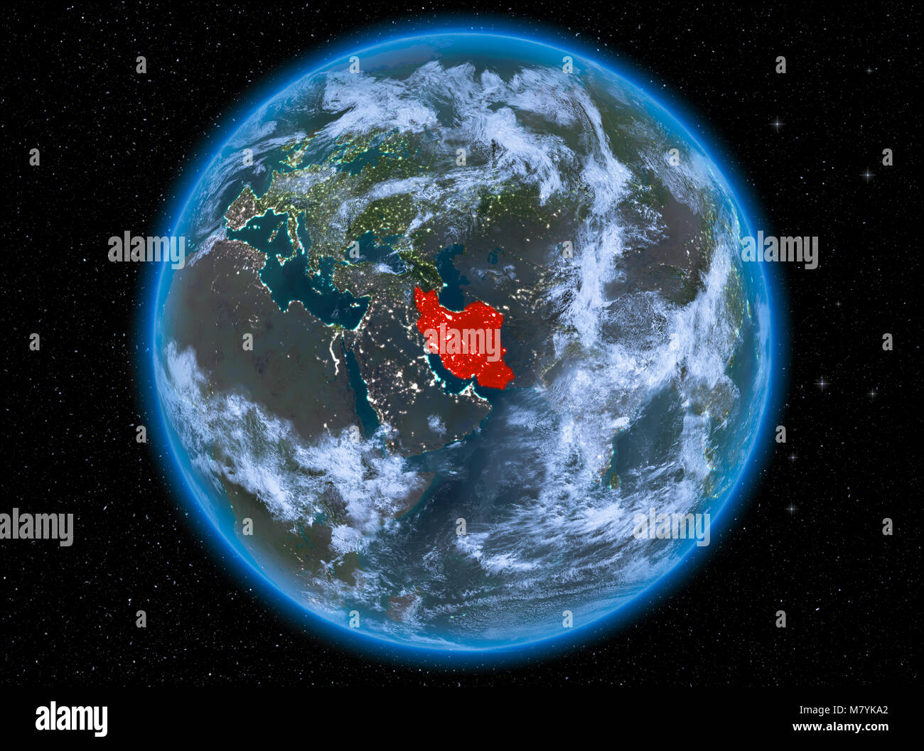 Night view of Iran highlighted in red on planet Earth with atmosphere ...