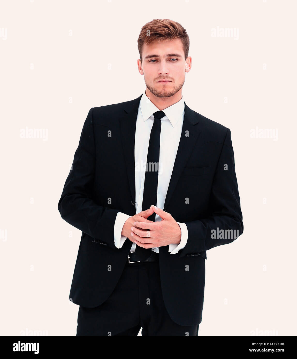 portrait in full length of serious young businessman Stock Photo - Alamy