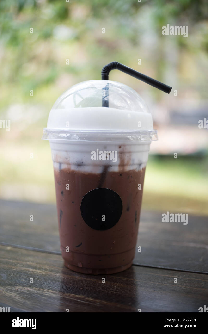 Morning light ice coffee cup in coffee shop Stock Photo - Alamy