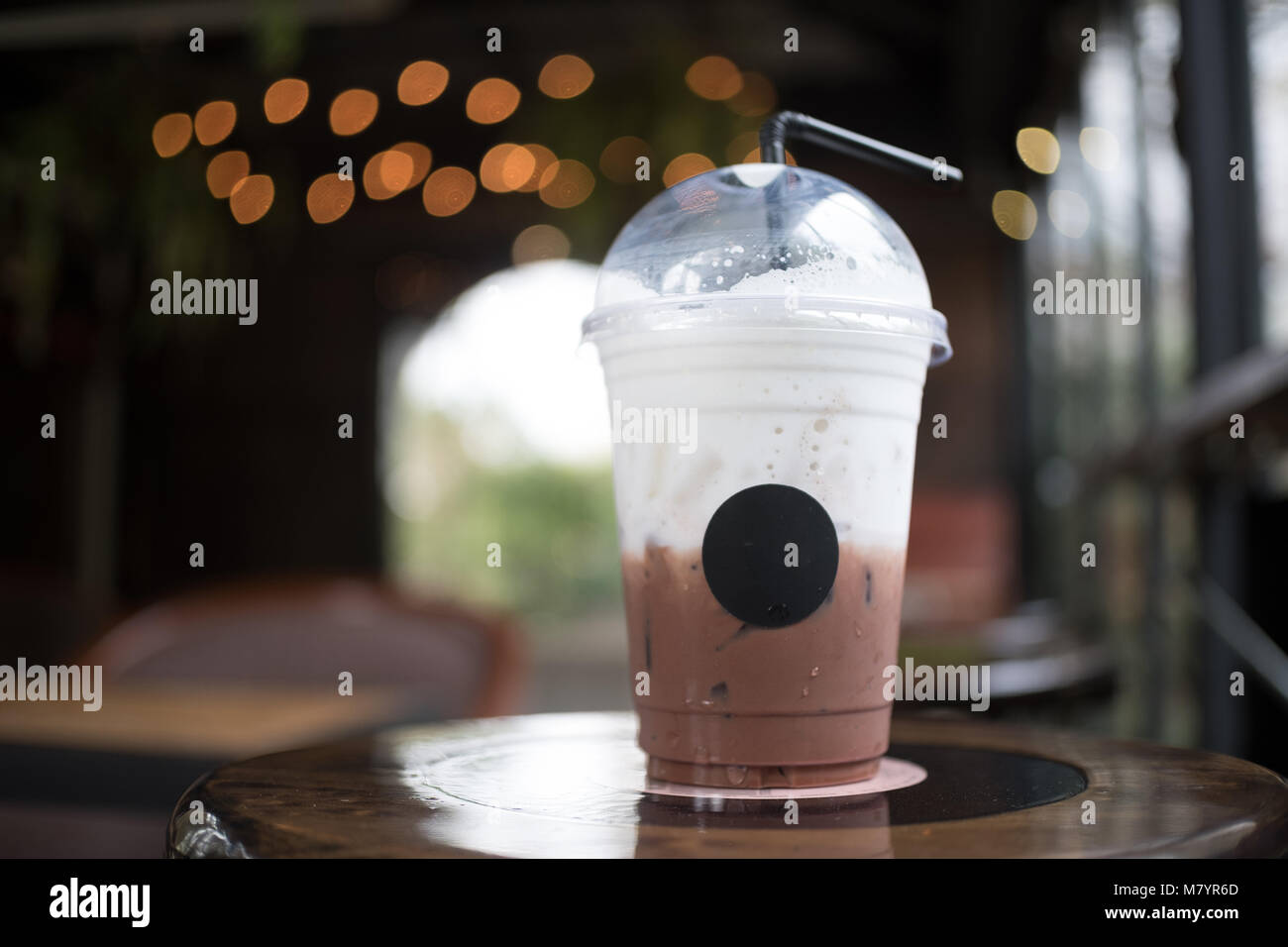 Morning light ice coffee cup in coffee shop Stock Photo - Alamy