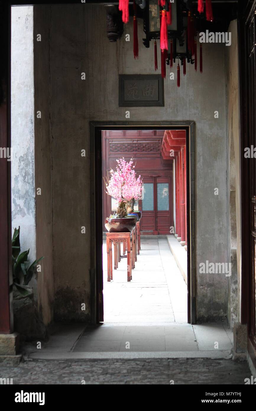 Doorway into a courtyard garden Stock Photo - Alamy