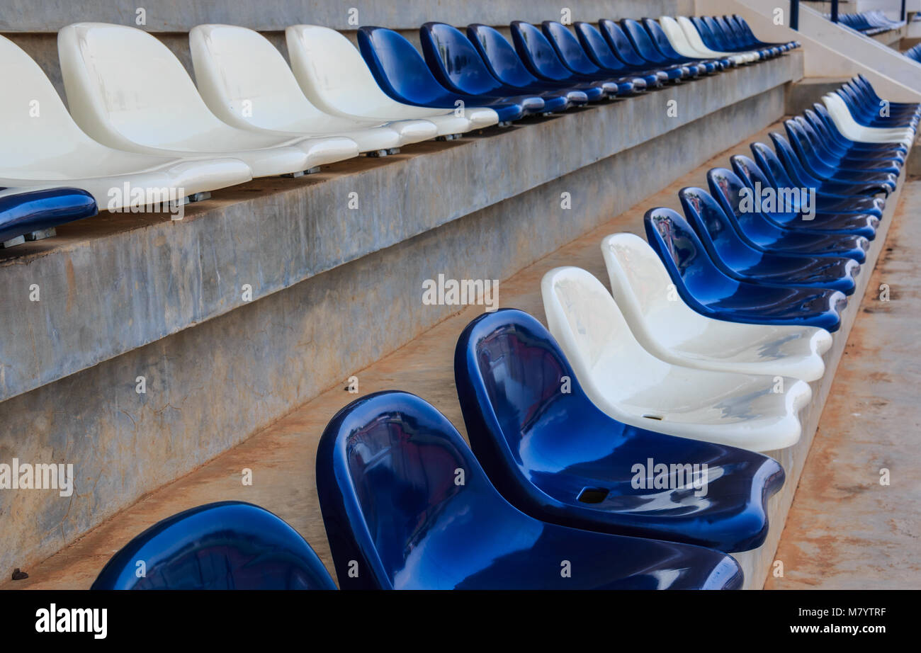 Row of Grandstand chairs in stadium Stock Photo - Alamy