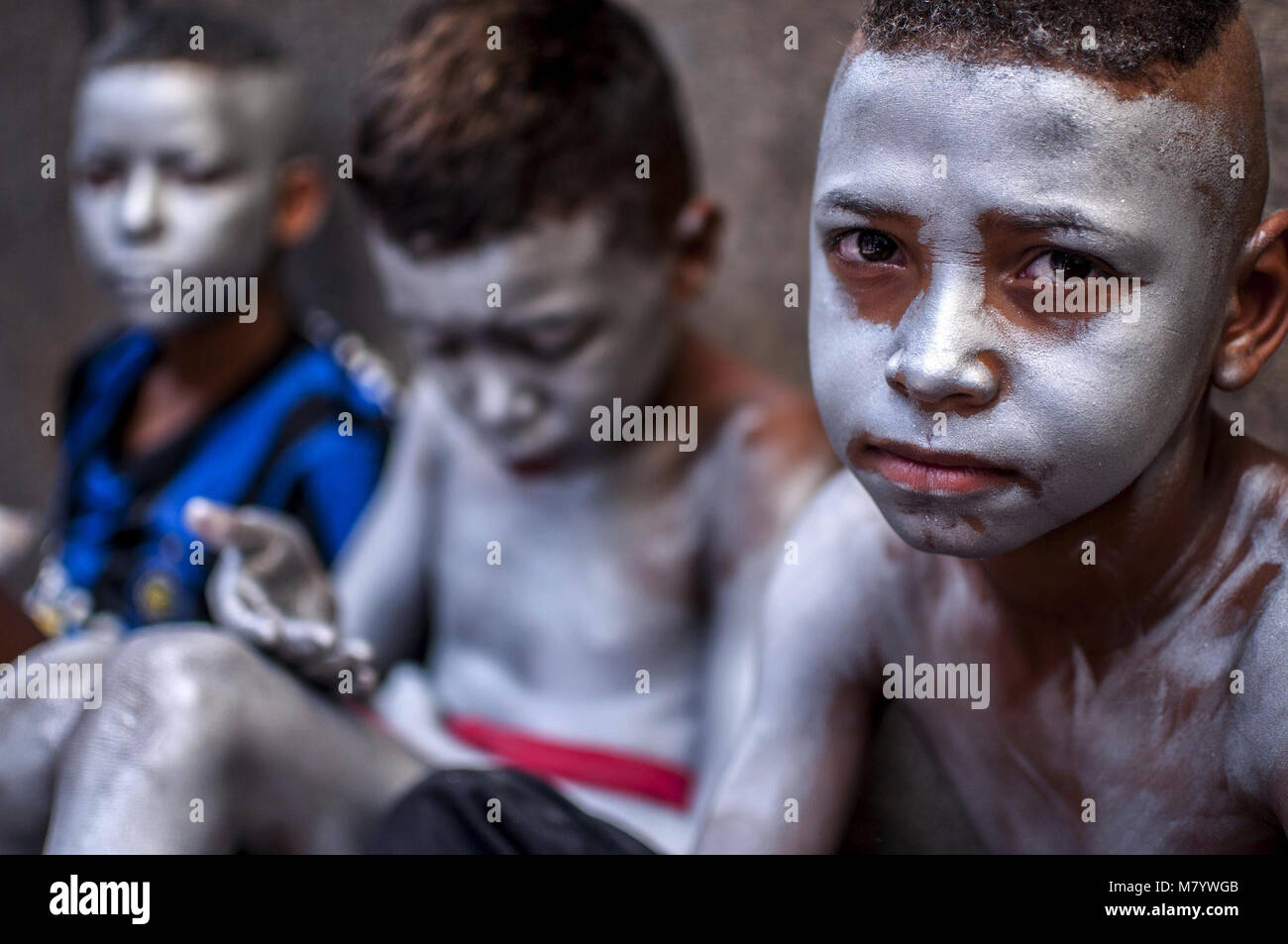 Sao Paulo, Brazil. March 13, 2018 SILVER BOYS :Boys painted in silver ...