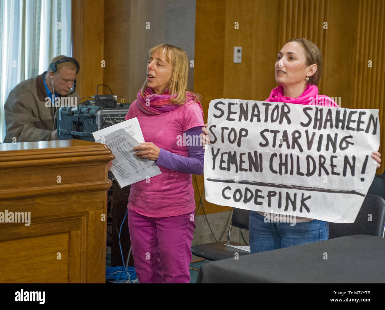 Washington, USA. 13th Mar, 2018. Code Pink protestors attempt to draw ...