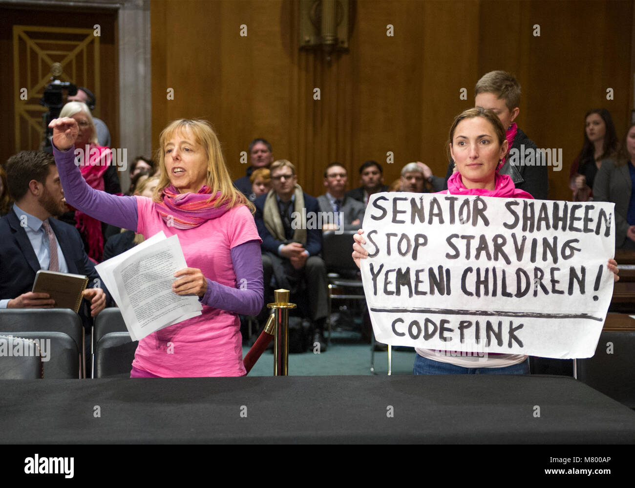 Washington, USA. 13th Mar, 2018. Code Pink protestors attempt to draw ...