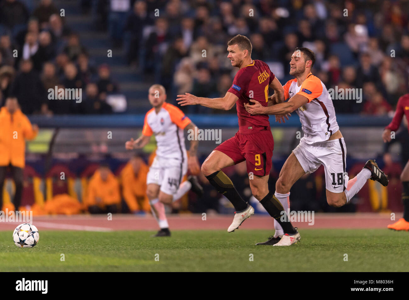Edin Dzeko of Roma and Ivan Ordets of Shakhtar Donetsk foul expulsion ...