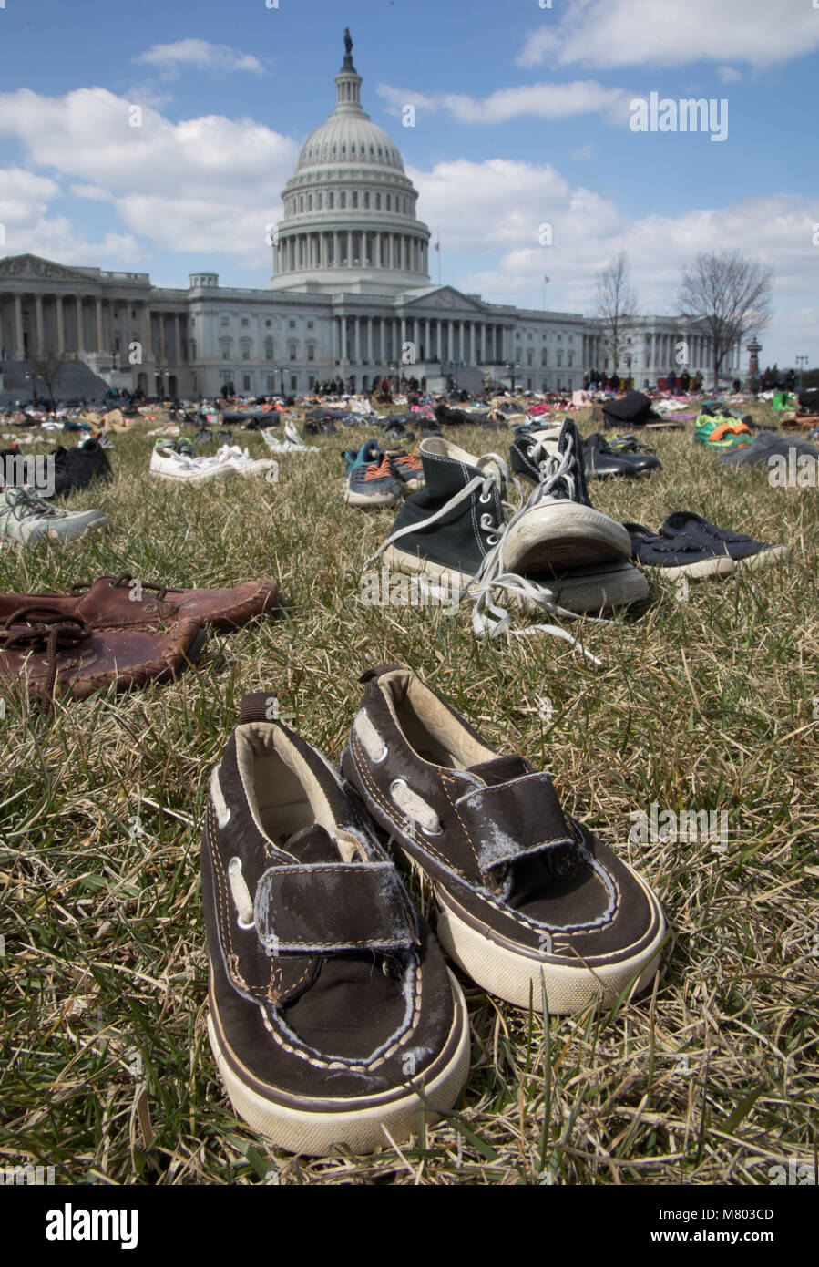 Seven thousand pairs of empty shoes were lined up on the southeastern ...