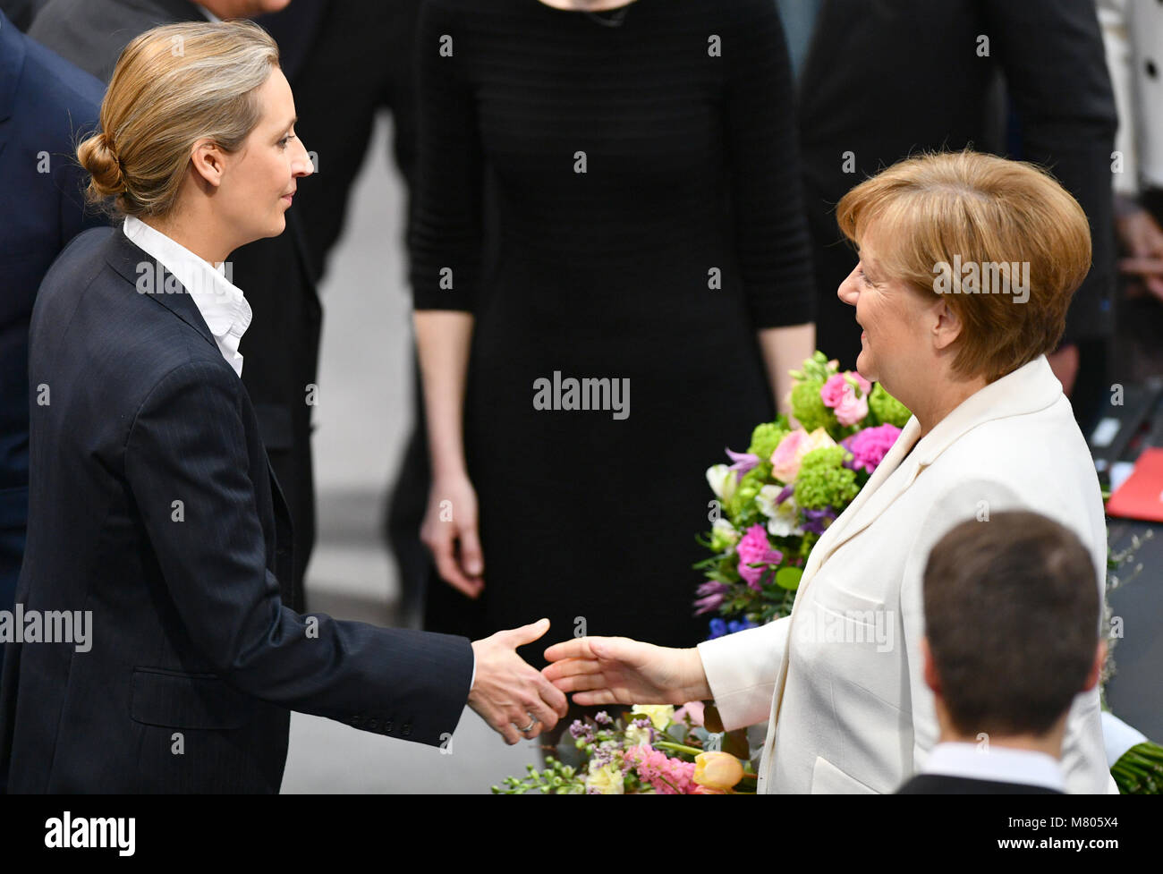 Berlin, Germany. 14th Mar, 2018. Alice Weidel (AfD) congratulates ...