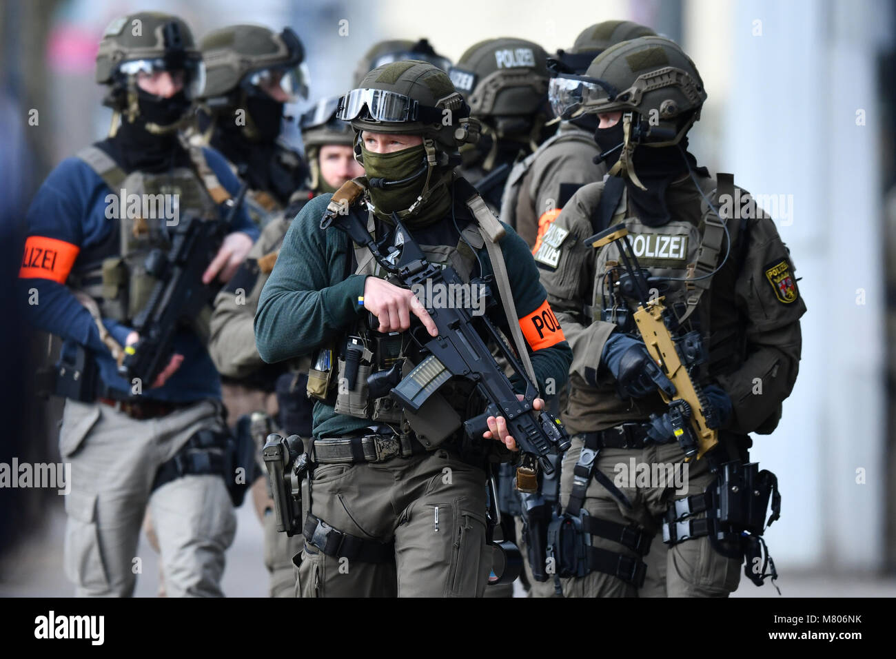 Ludwigshafen, Germany. 14th Mar, 2018. Heavily armed officers of a ...