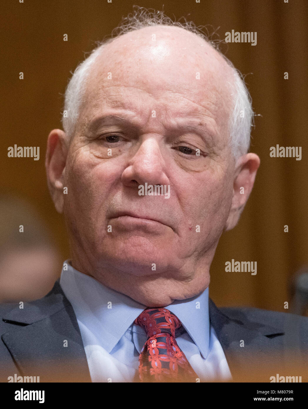 United States Senator Ben Cardin (Democrat of Maryland) listens as ...