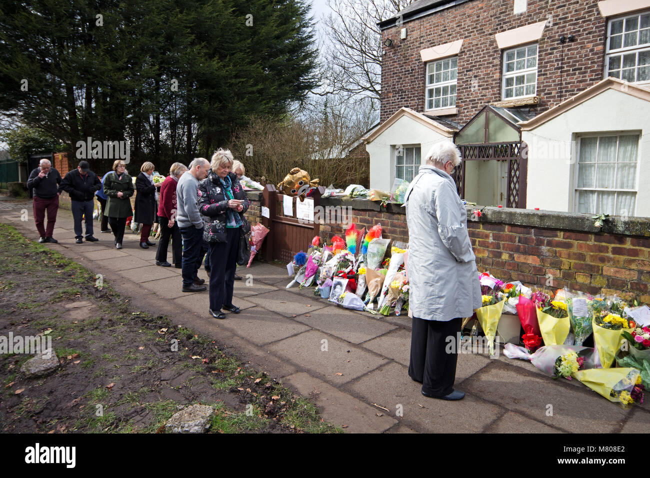 Knotty Ash, Liverpool, UK. 14th March 2018. Floral tributes being ...