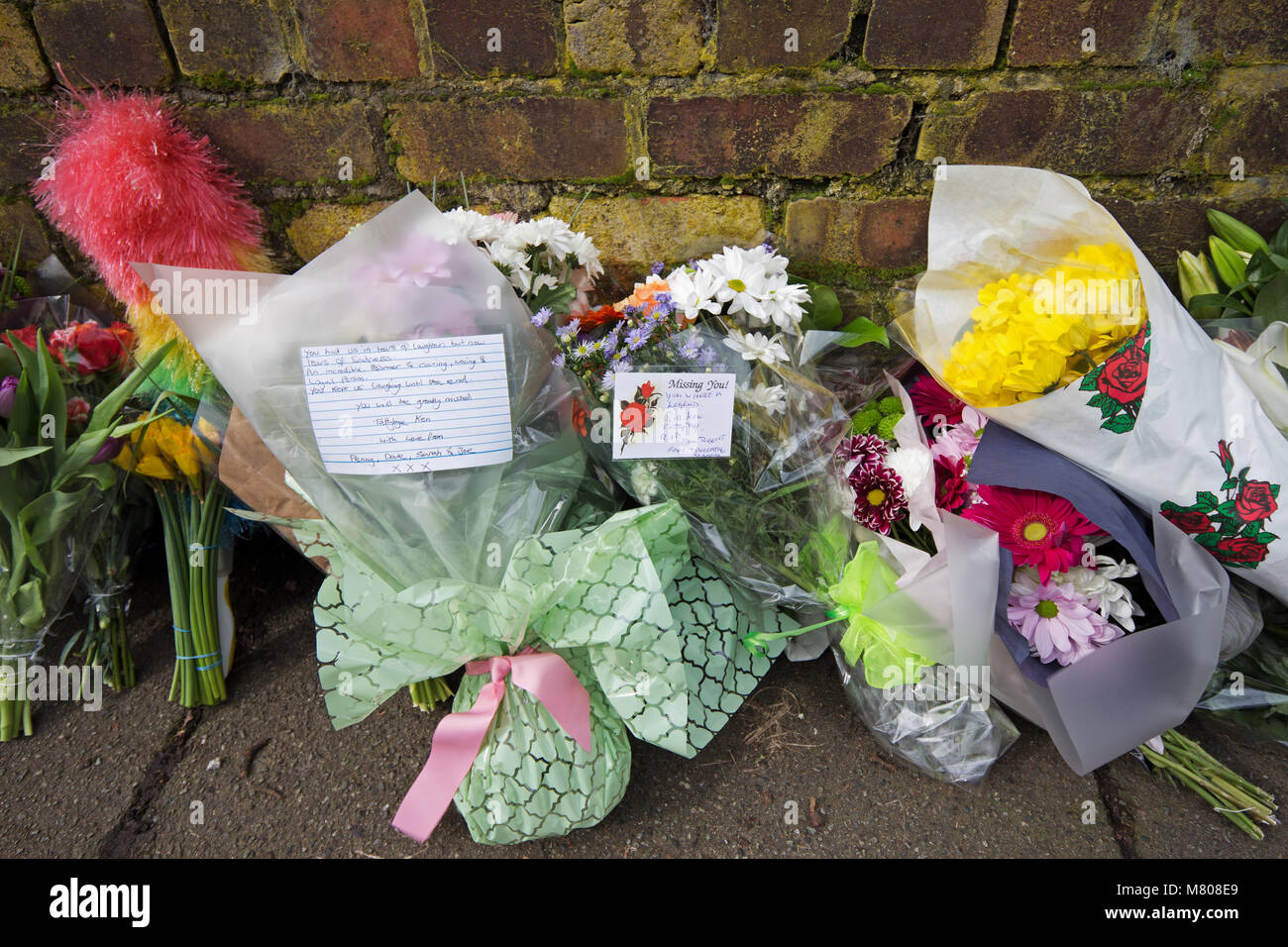 Knotty Ash, Liverpool, UK. 14th March 2018. Floral tributes being ...