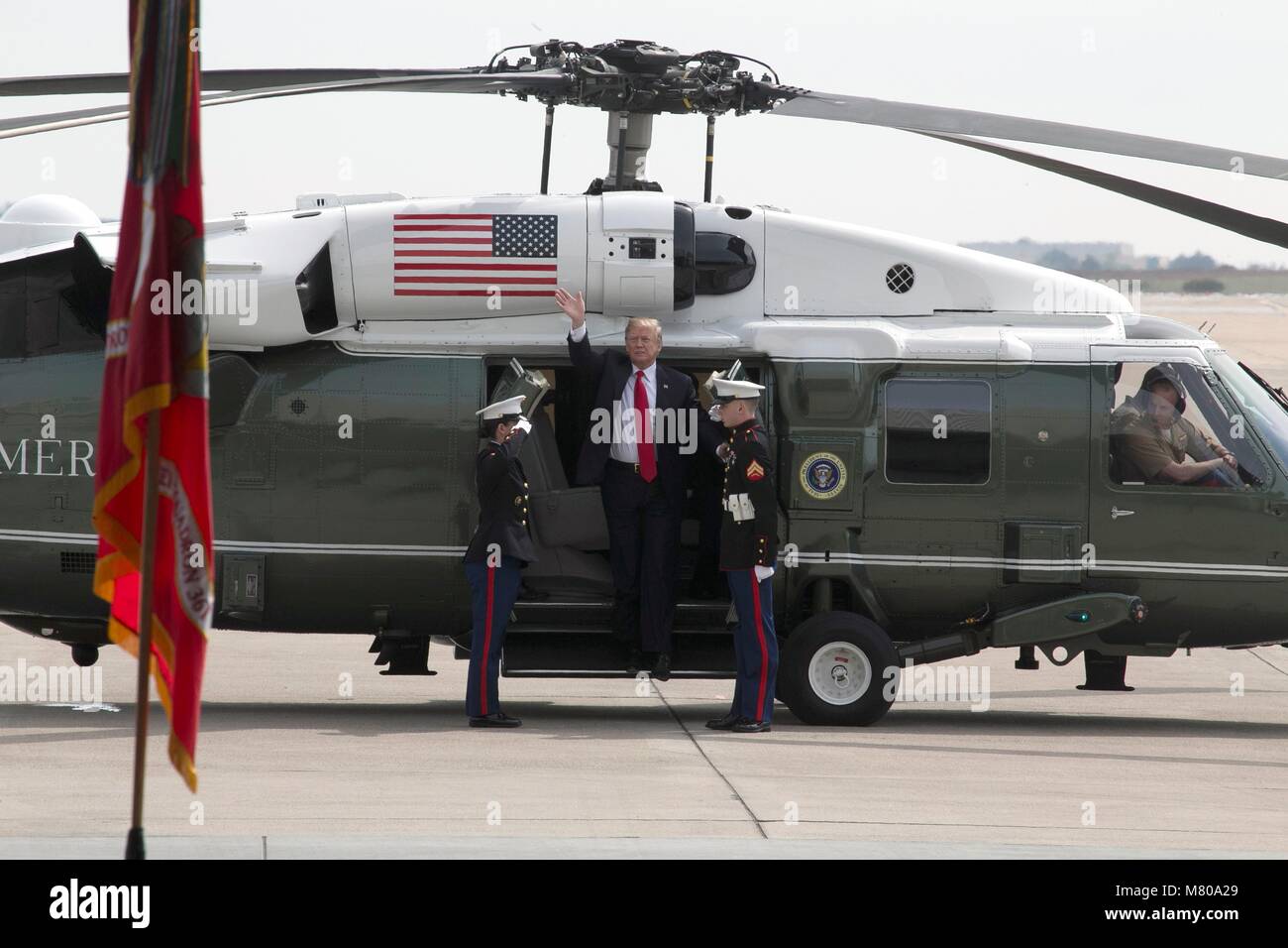 U.S President Donald Trump waves from Marine One at Marine Corps Air ...