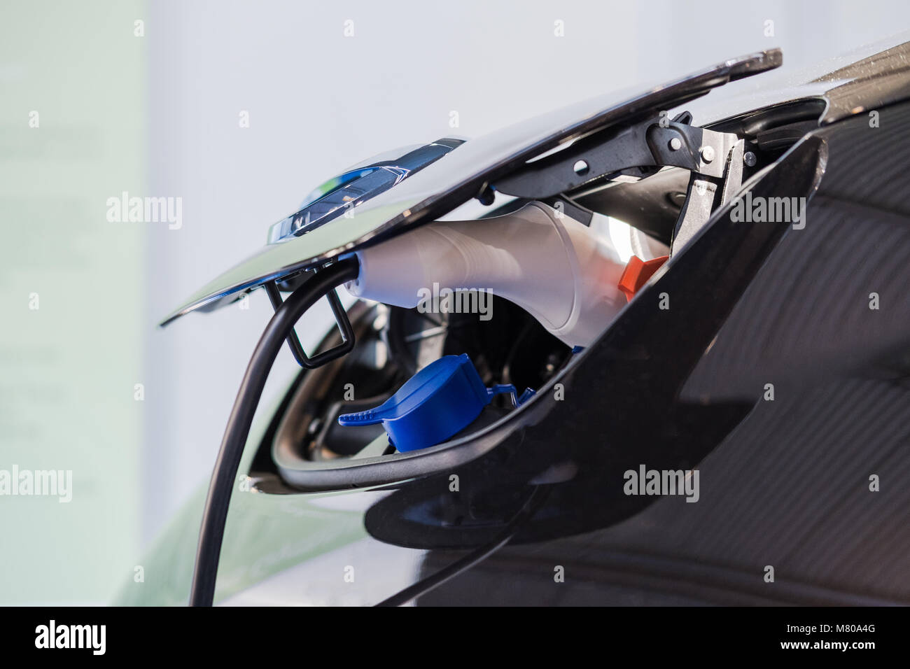 Electric car being charged up hi-res stock photography and images - Alamy