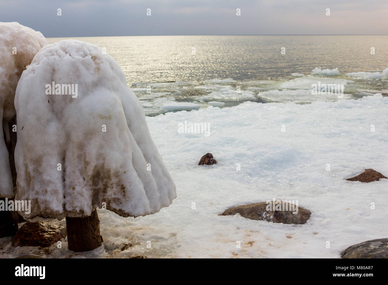 Jetty Pillar Covered with Snow, Looking like a Mushroom on a Sunny ...
