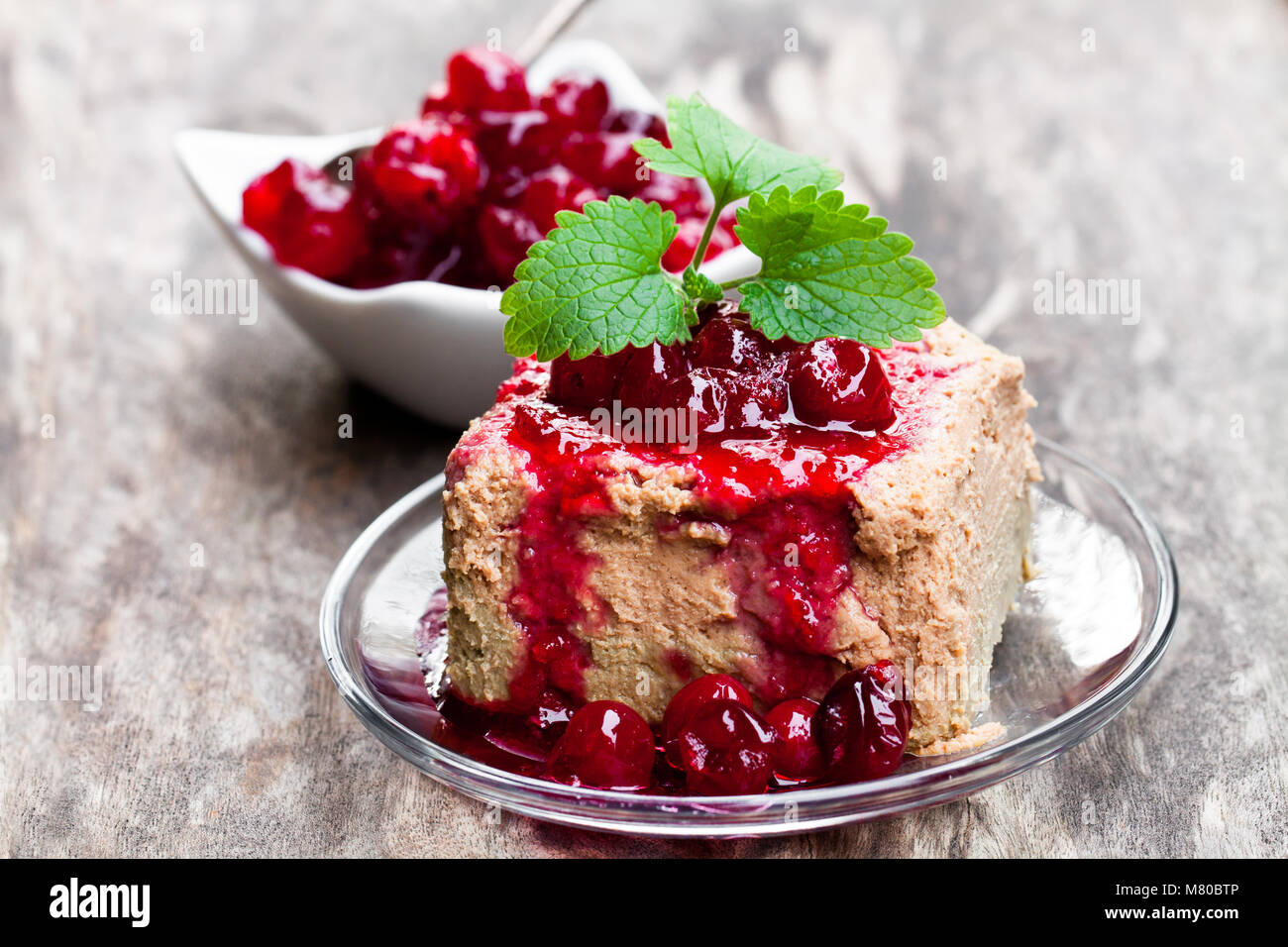 poultry liver pate with cranberry sauce on a plate Stock Photo - Alamy