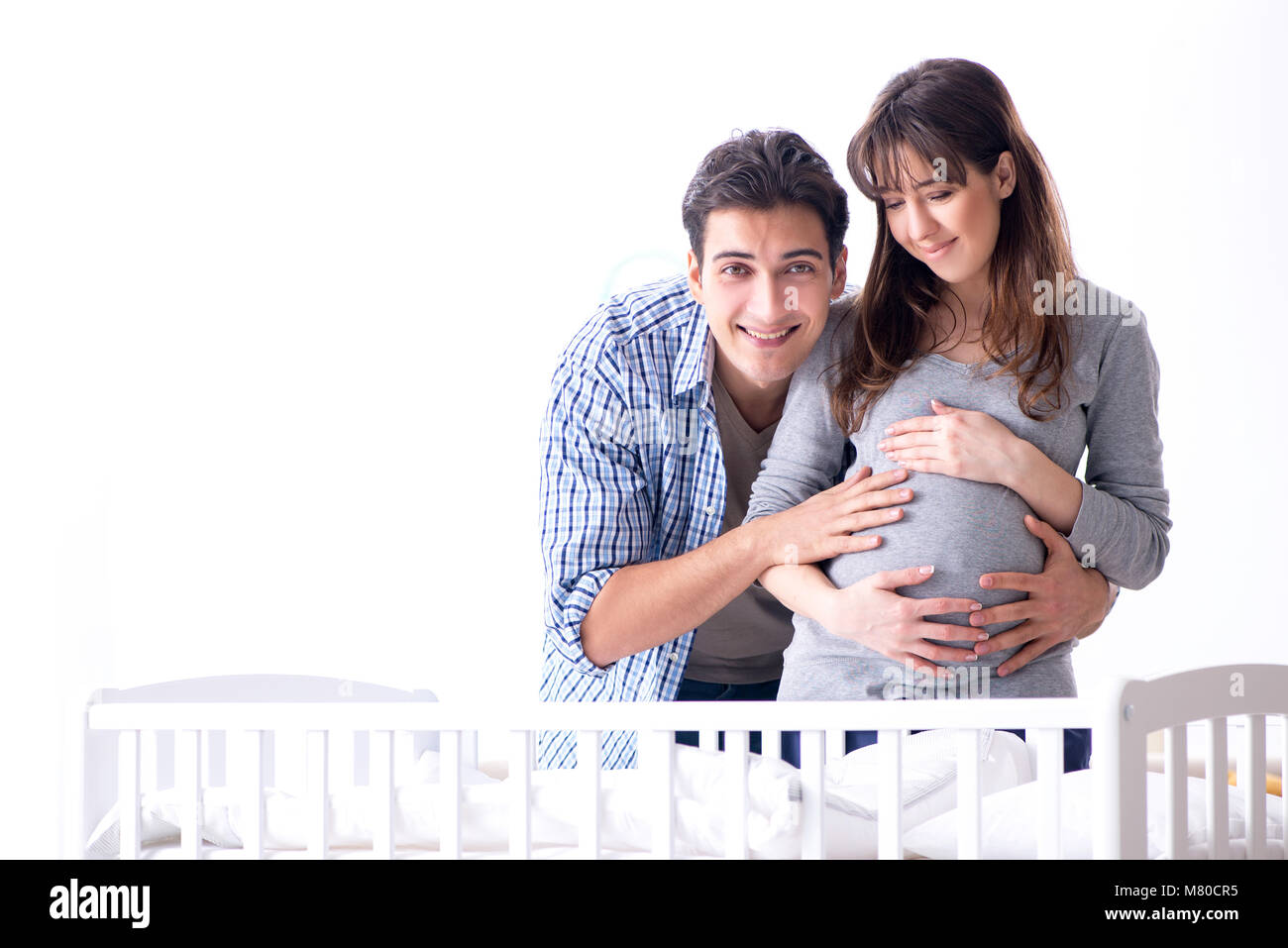 Young parents expecting their first baby Stock Photo - Alamy
