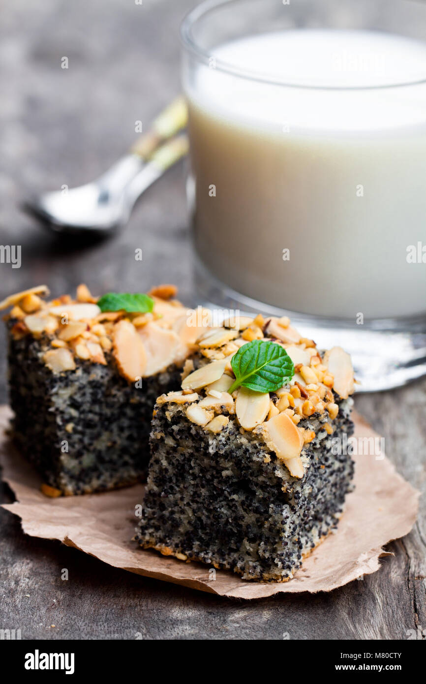Poppy seed pie freshly baked with fresh milk on wooden background Stock ...